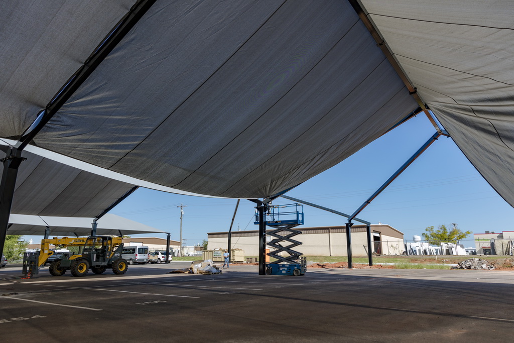 Vehicle Sun & Hail Protection for Airports & Car Dealerships
